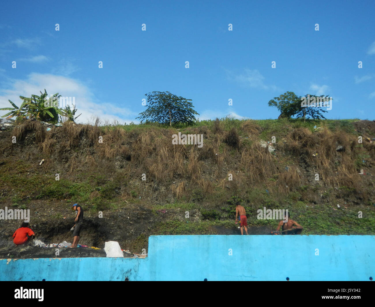 A photograph showing Barangay 128 in the Smokey Mountain area of Tondo ...
