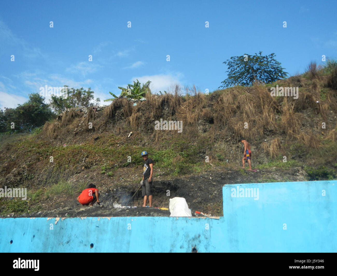 This image shows Barangay 128 in the Smokey Mountain area of Tondo ...