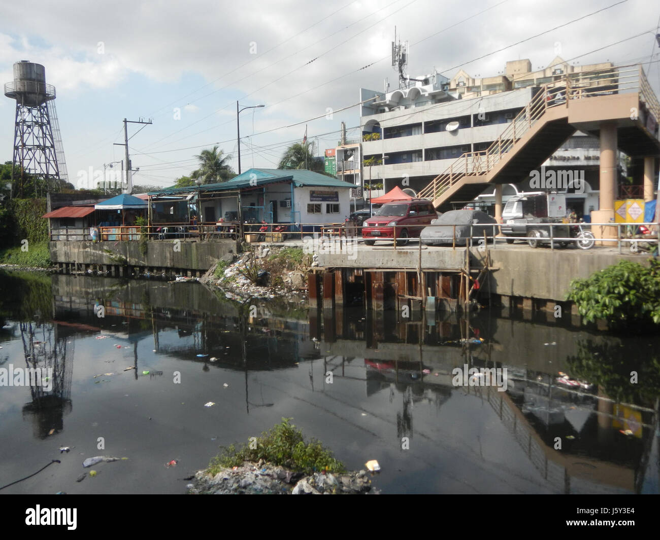 This image features a pedestrian footbridge near Puregold Tayuman and ...