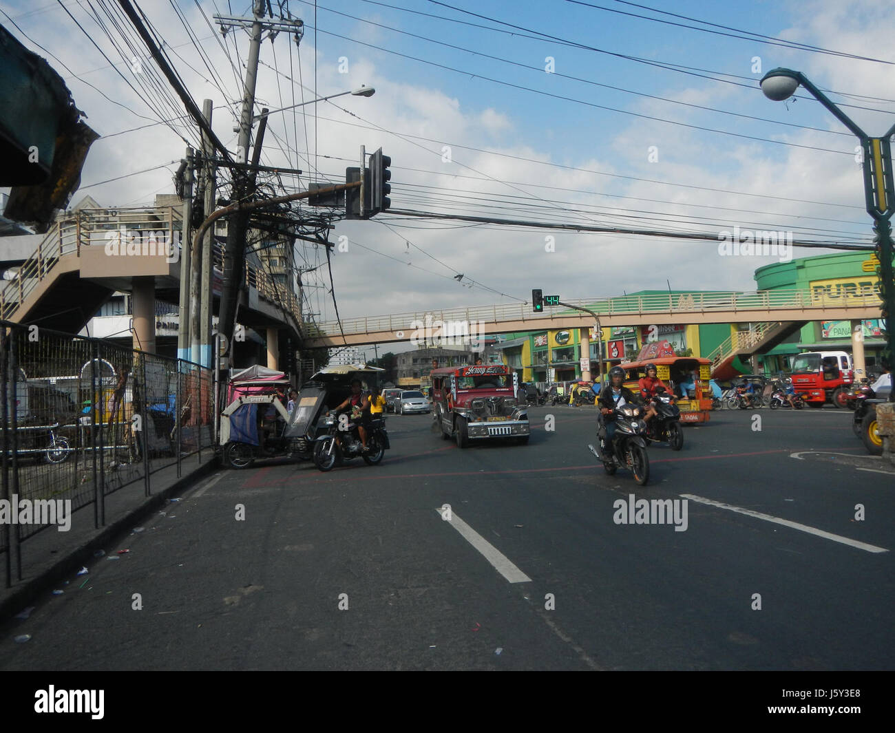 An image of the pedestrian footbridge in Manila, located near Puregold ...