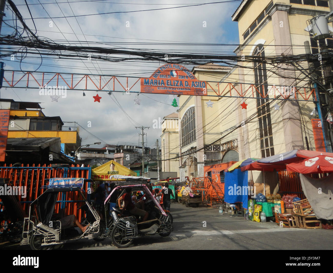 This photograph captures the New Pritil Public Market located on Juan ...