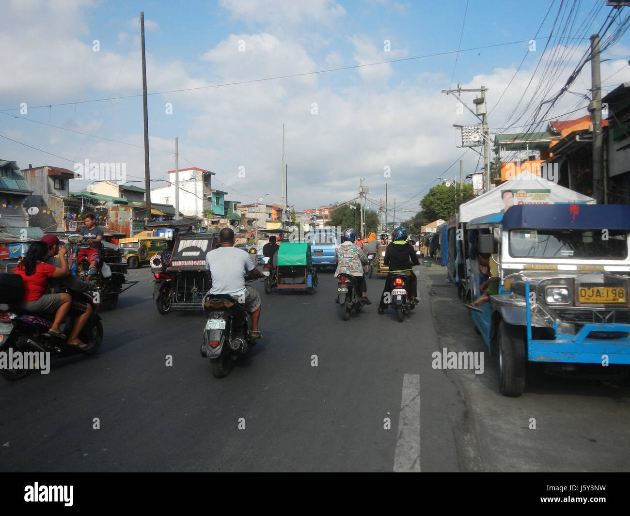 This image shows a busy intersection in Tondo, Manila, where Capulong Street, Juan Luna, Herbosa ...