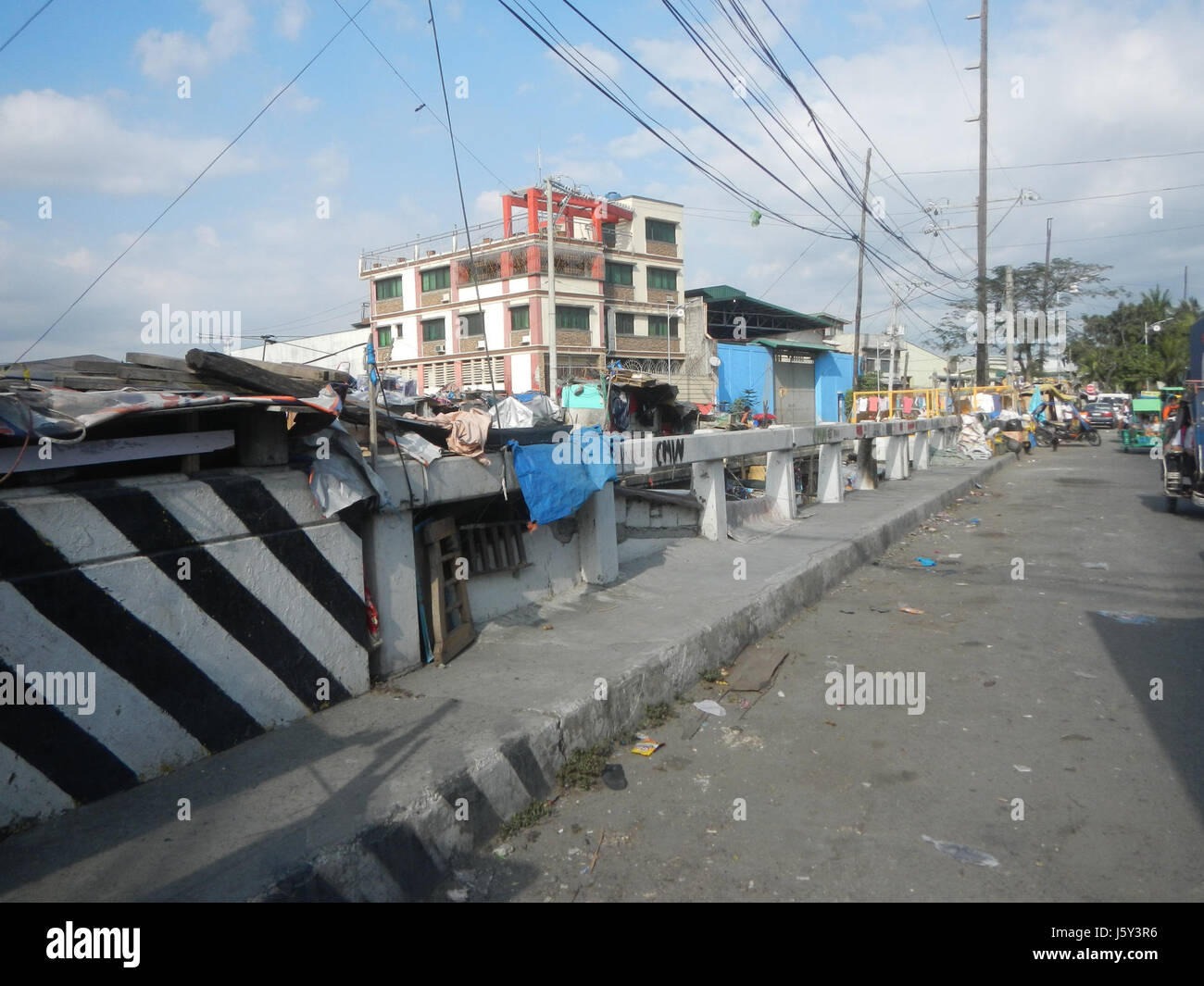This image shows a bustling area of Tondo, Manila, with the C-4 Road ...