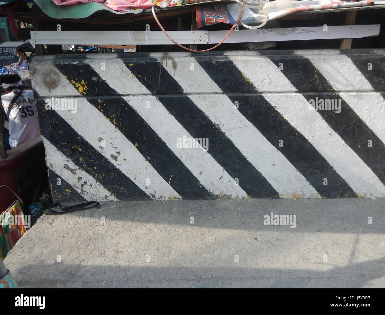 The image shows the C-5 Road section in Tondo, Manila, near the ...