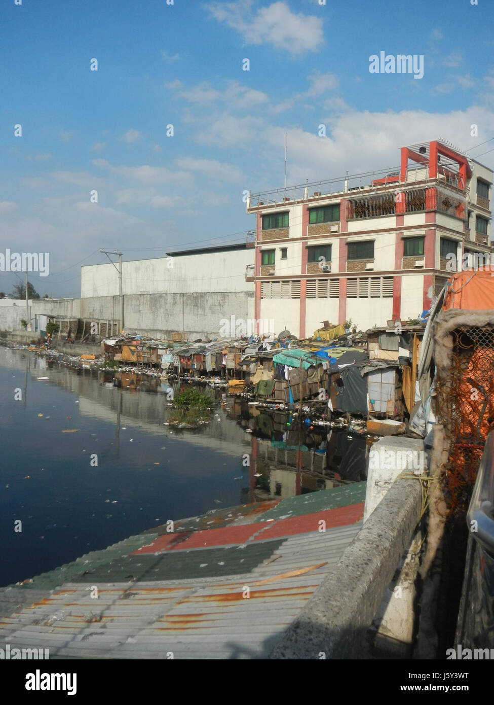 This image shows the road network in Tondo, Manila, highlighting C-32 ...