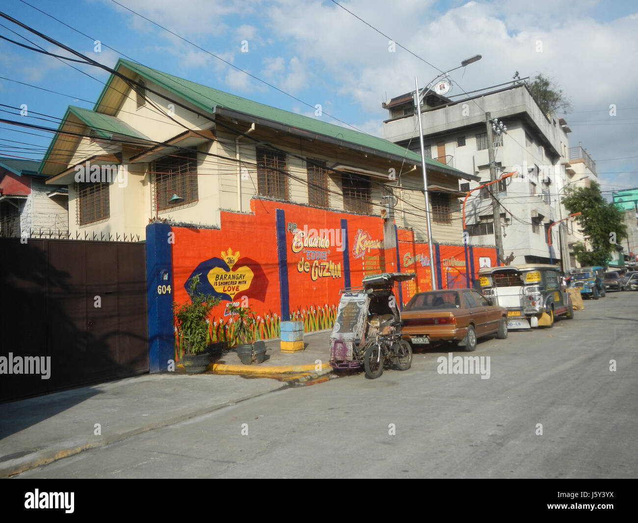 This image shows the streets of Barangays Tondo, Manila, with a focus ...