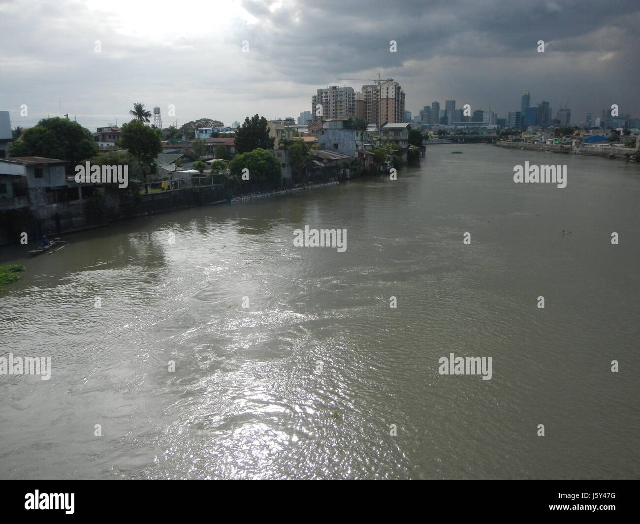 This image showcases the Kalawaan Bambang Bridge spanning the Pasig ...