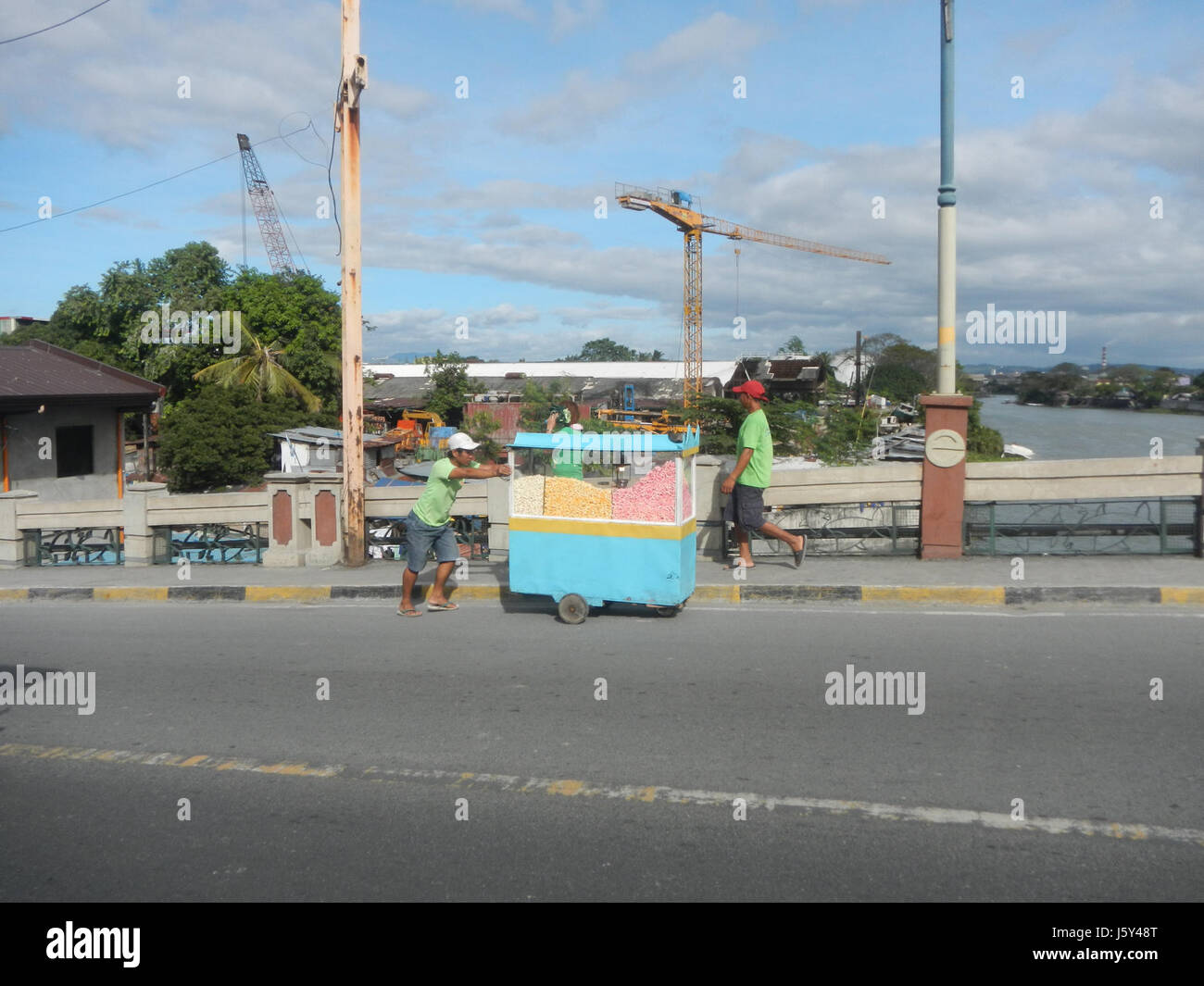 This image shows the Kalawaan Bambang Bridge over the Pasig River ...