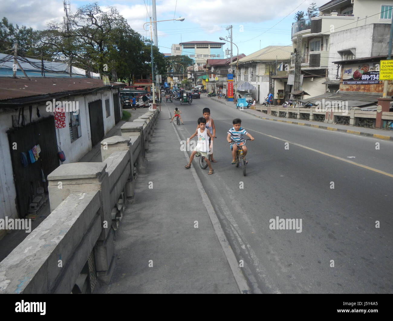 This image shows Kalawaan Bambang Bridge, crossing the Pasig River, and ...