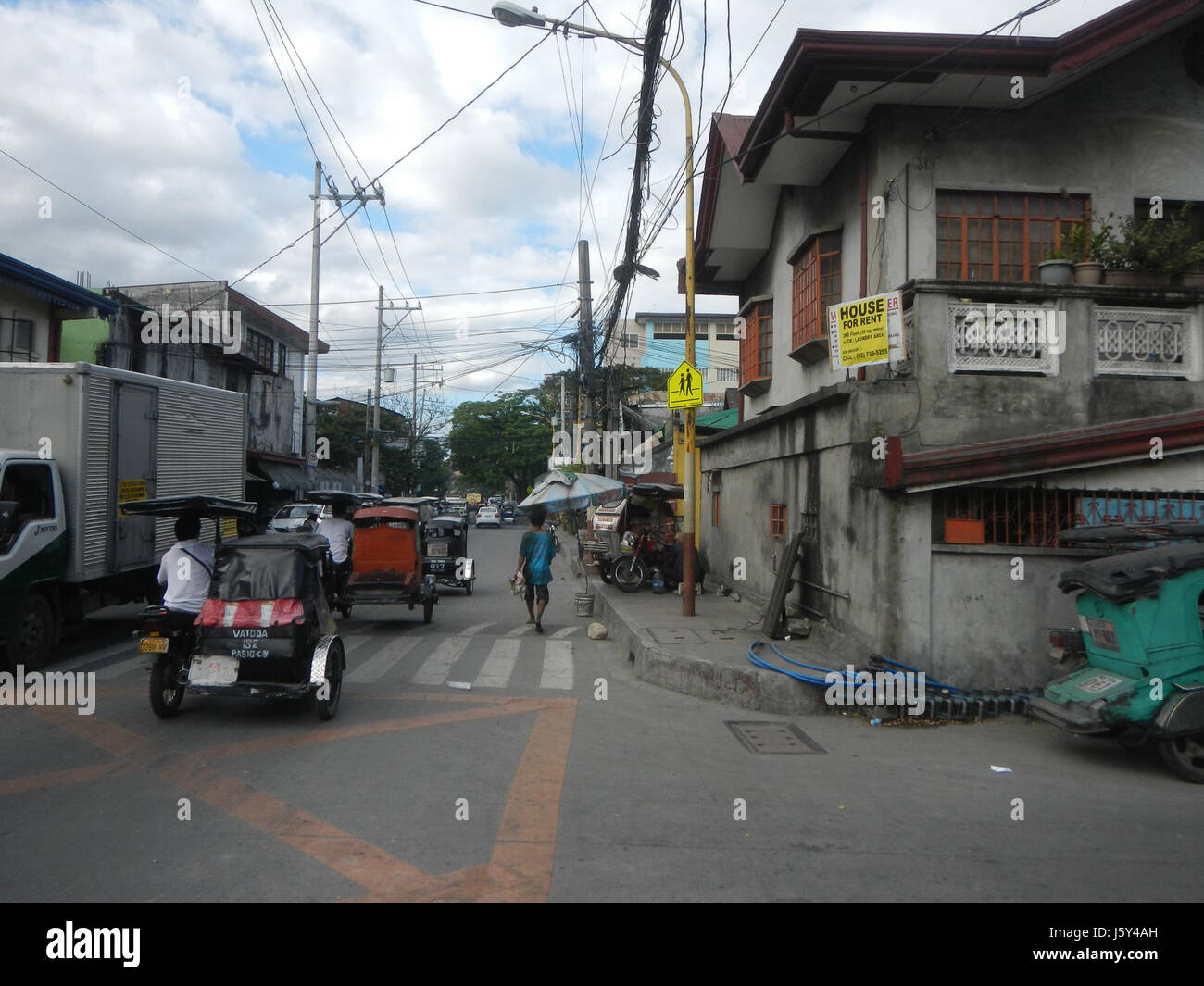 The Kalawaan Bambang Bridge in Pasig City spans the Pasig River. It connects local streets and ...