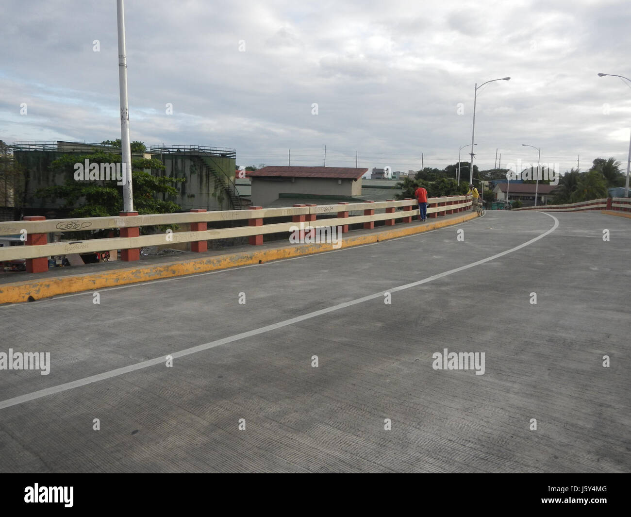 This image depicts flood control efforts at the Sumilang Buting Bridge ...