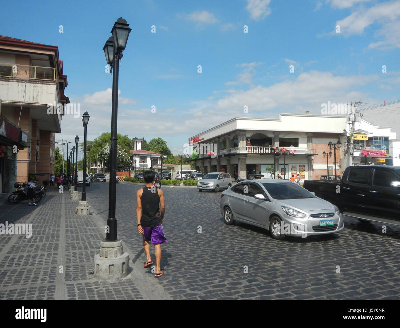 This image depicts the urban landscape of Angeles City, Philippines ...