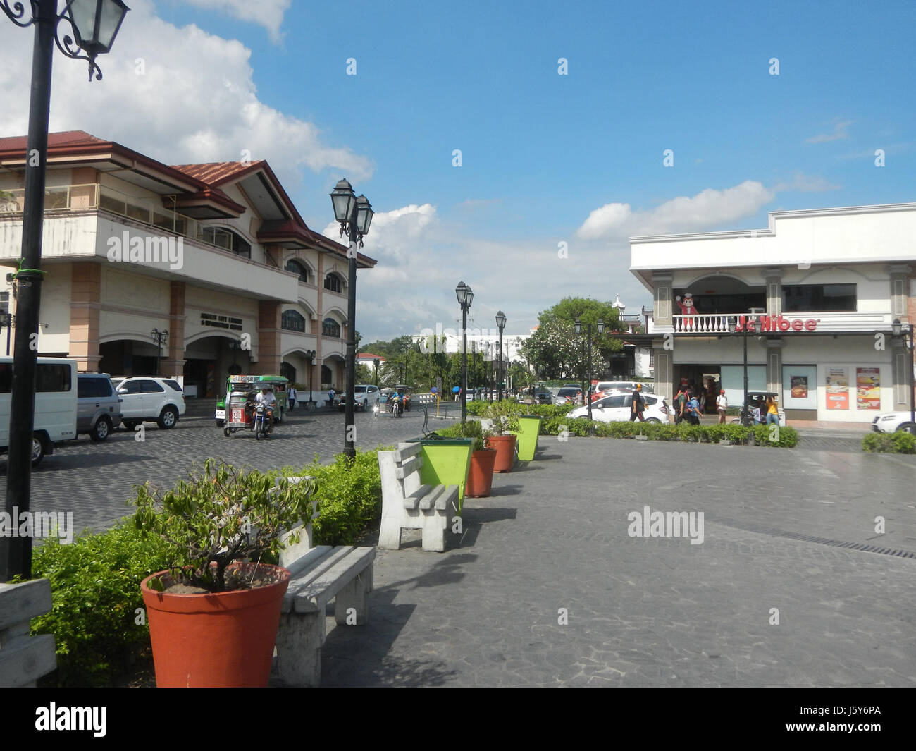 This image captures a view of Angeles City in the Philippines, focusing ...
