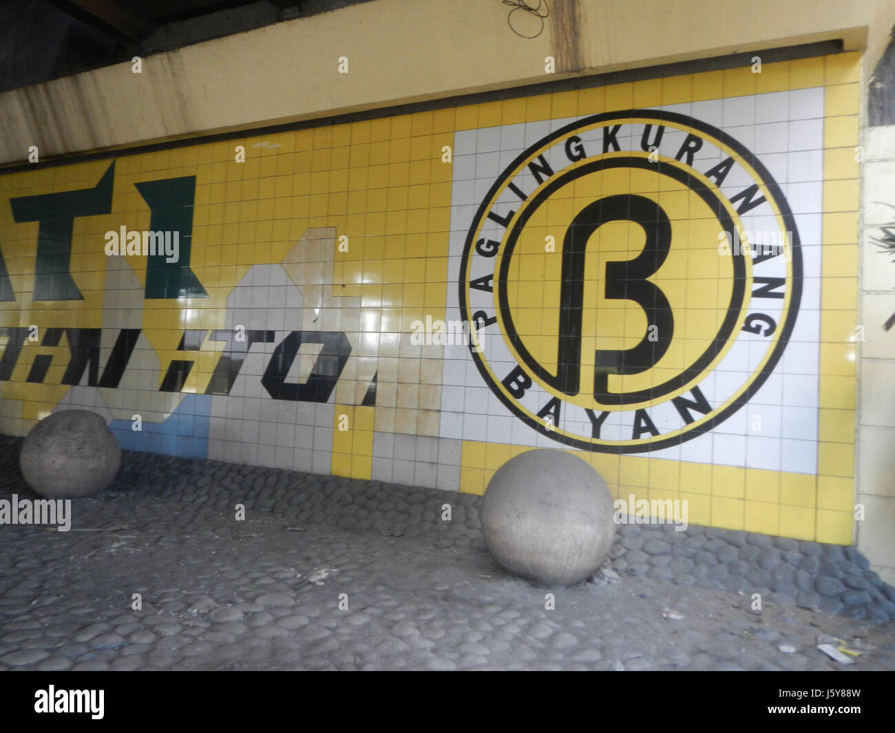 This image presents the Magallanes Interchange in Makati City ...