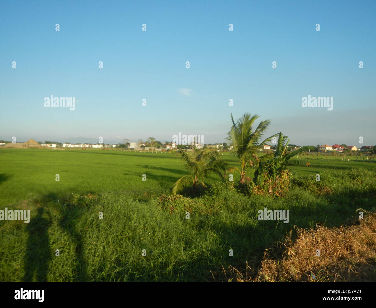 This photograph showcases the rural villages of Daungan and Tiaong in ...