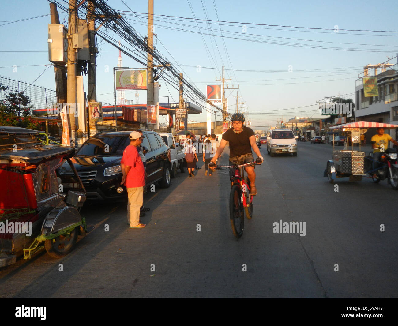 The scene showcases the Tiaong Tuktukan Highway with a breathtaking ...