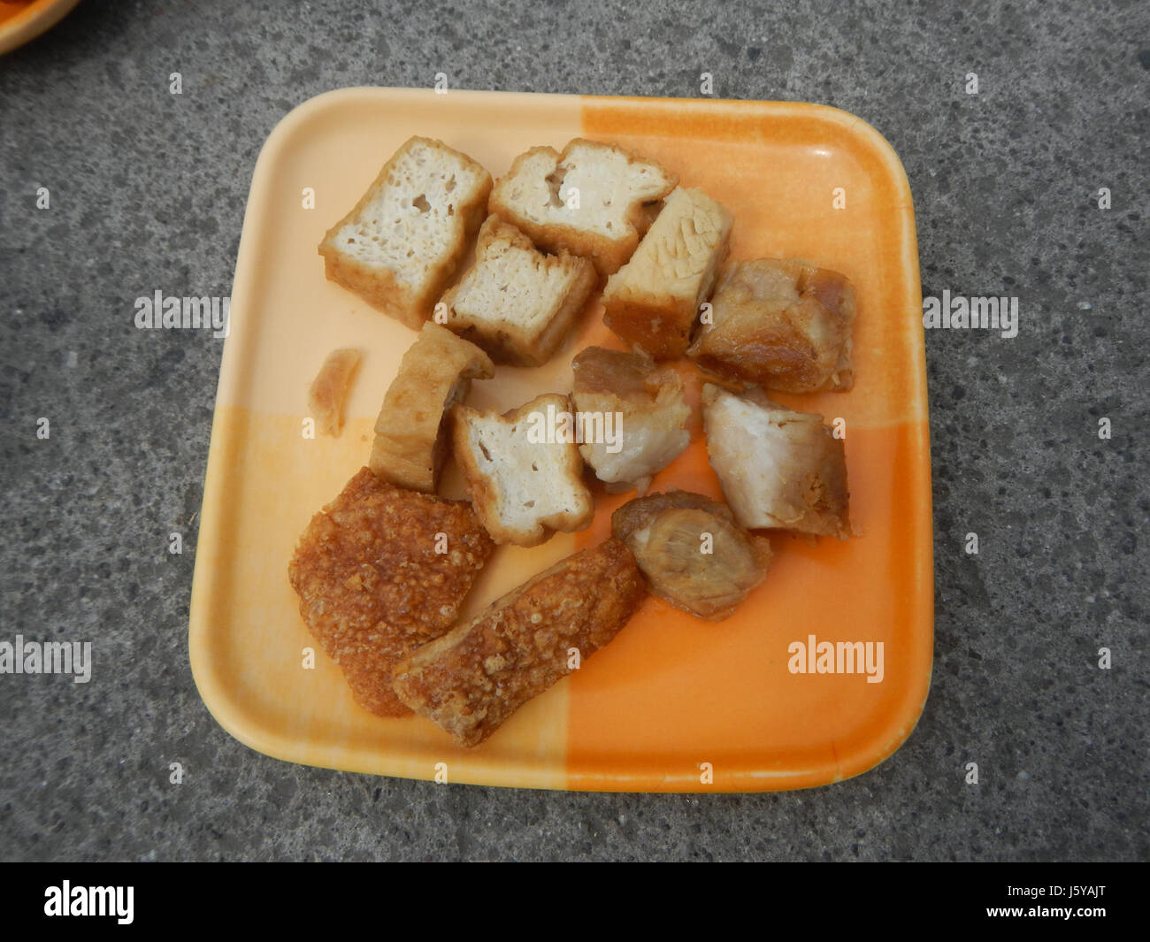 This dish, featuring fried itik (duck), pugo (quail), and pancit ...