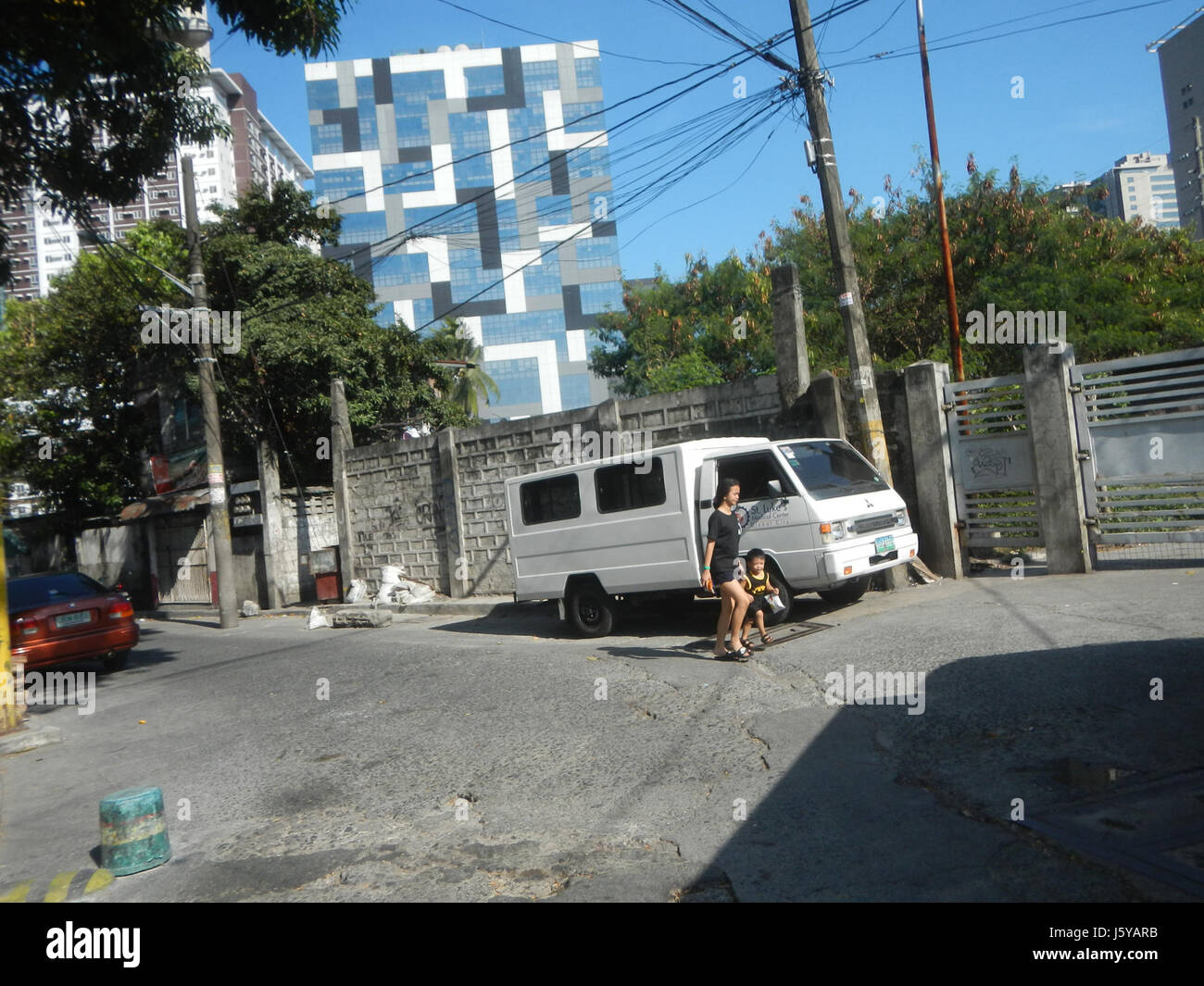 A photograph capturing a street scene at the intersection of 0091 ...