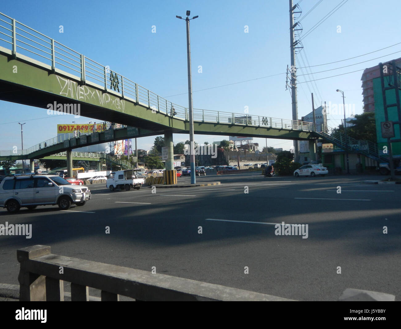 This pedestrian footbridge in East Rembo, Makati City, provides safe ...
