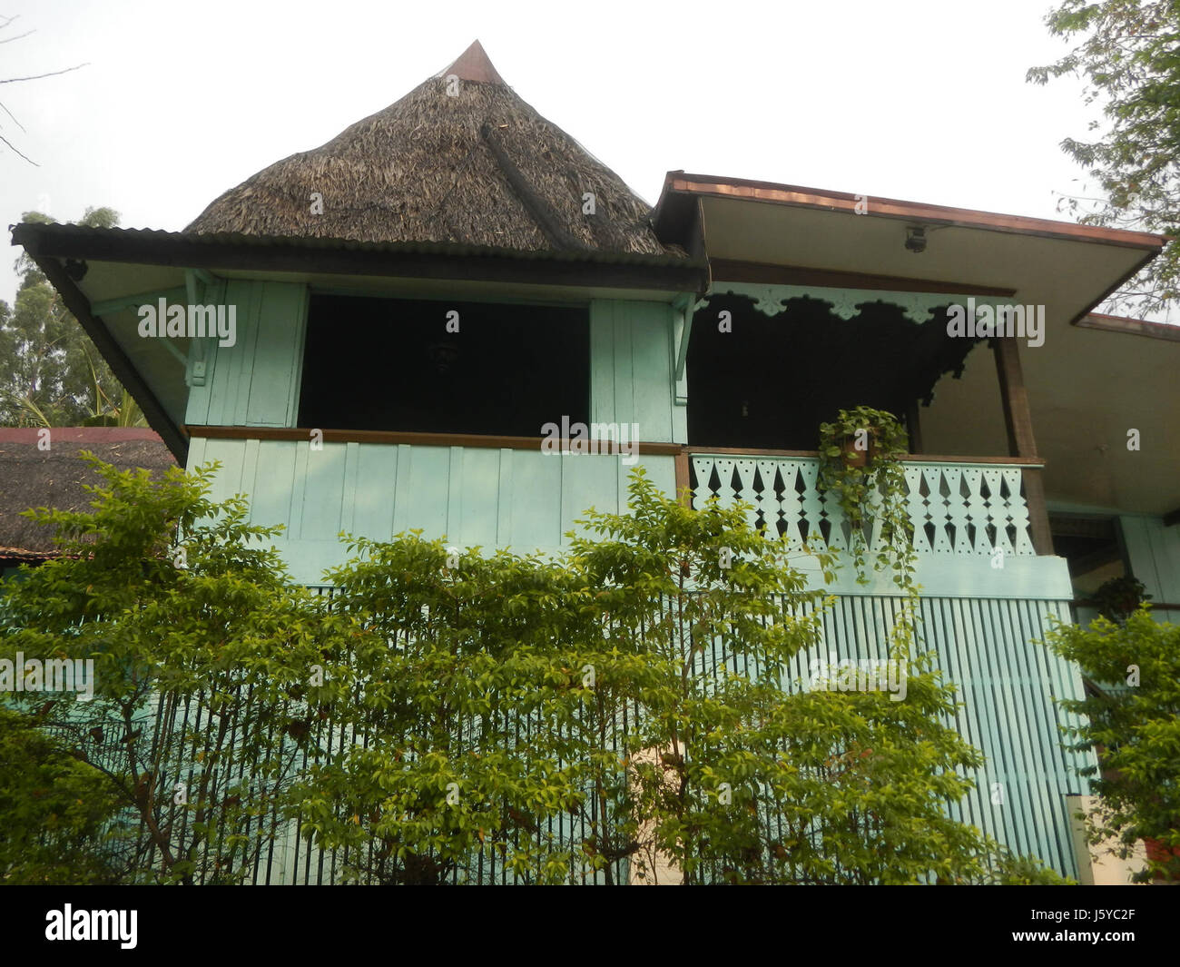 This image depicts the Mabini Shrine House Museum, located in Santa ...