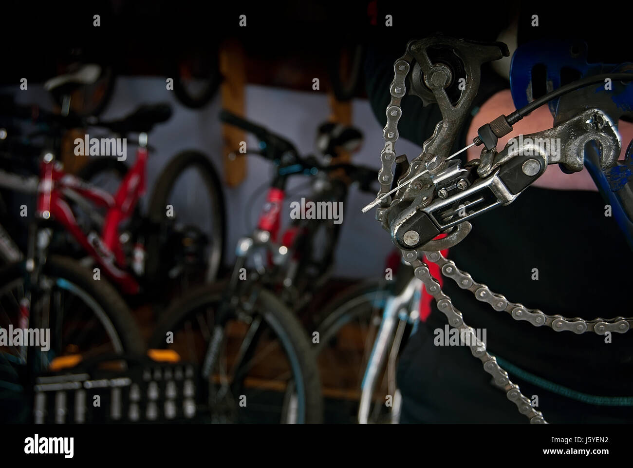 Master bike repairs workshop in their own hands Stock Photo - Alamy
