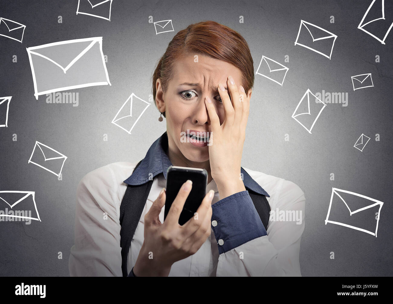 Upset stressed woman holding cellphone disgusted shocked with message ...