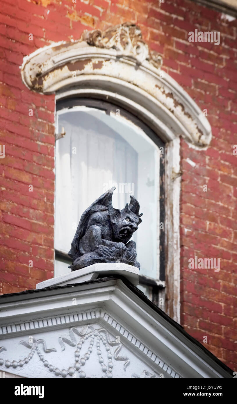 teeth scary creature gargoyle wings devil ears stone window porthole ...