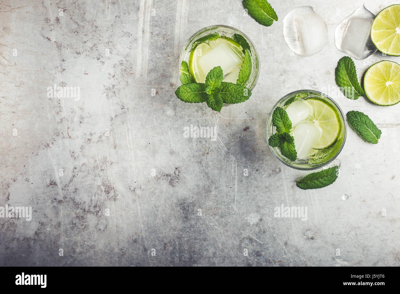 Mojito cocktail on light gray background with copy space for recipe or ...