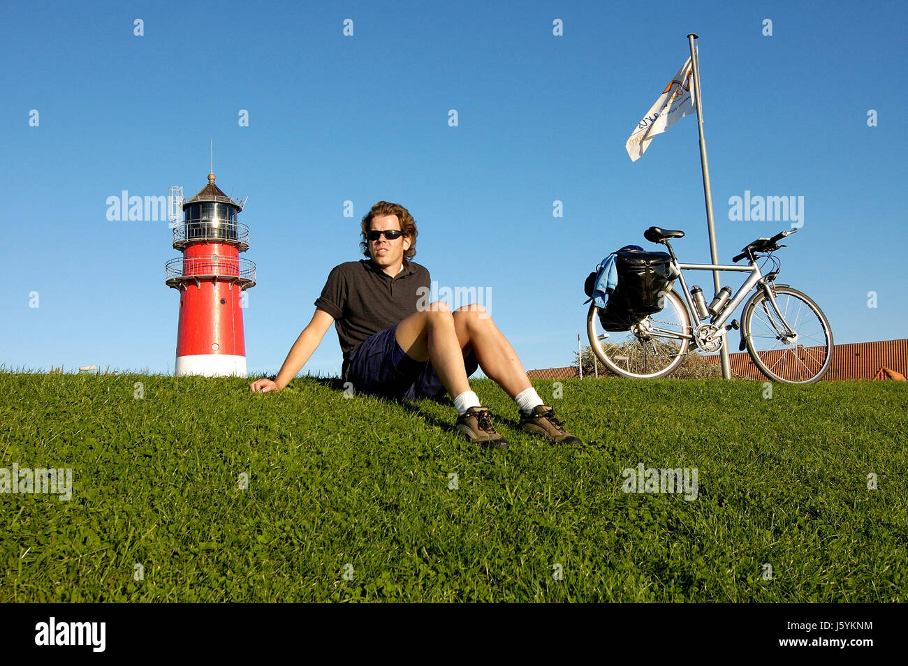 water north sea salt water sea ocean biker meadow lighthouse break rest ...