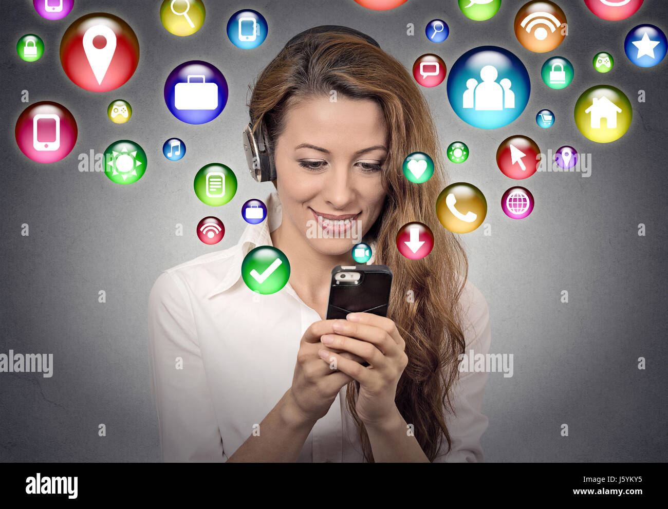 communication technology mobile high tech concept. Young woman using ...