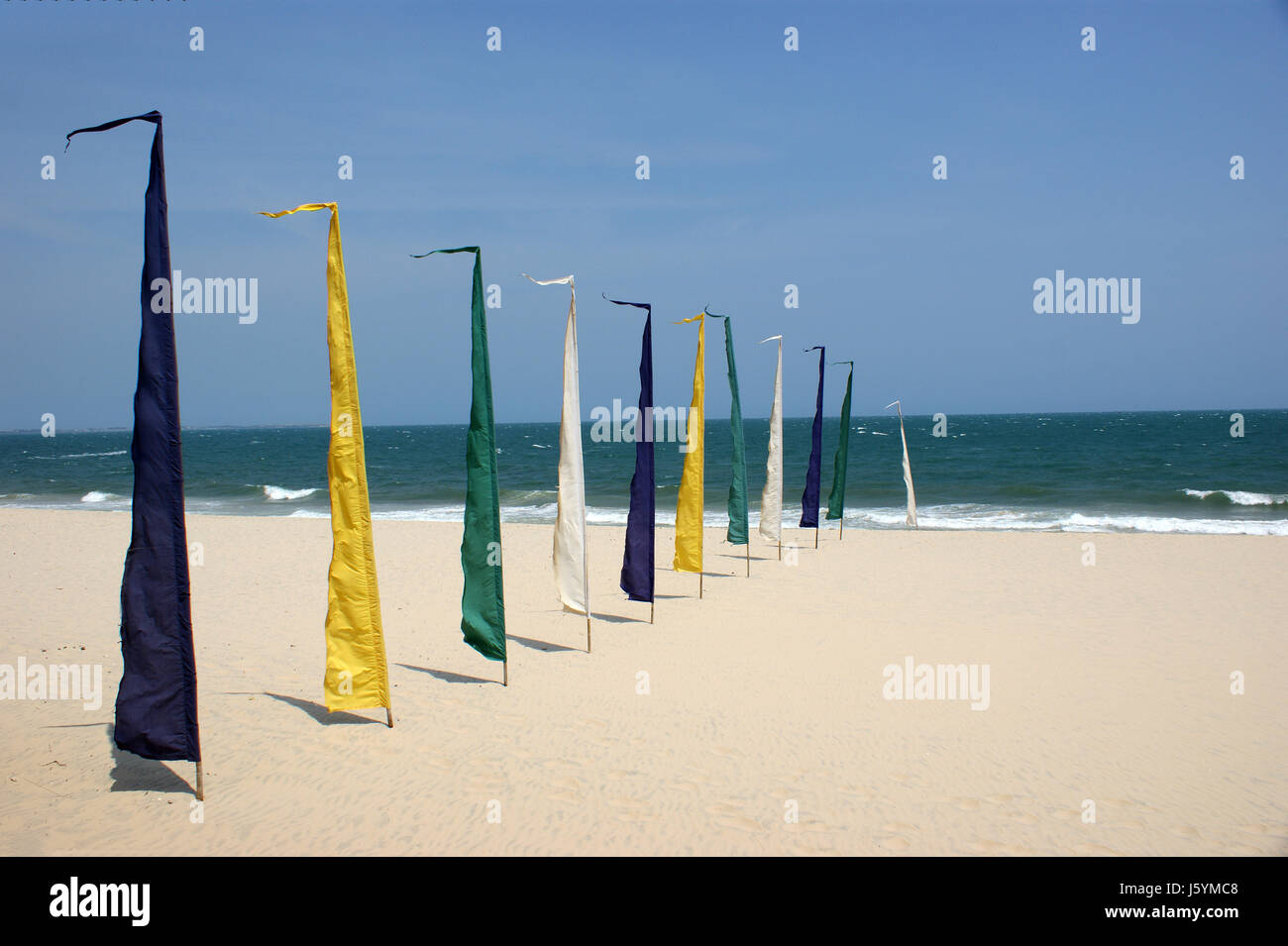 flags on the beach Stock Photo - Alamy