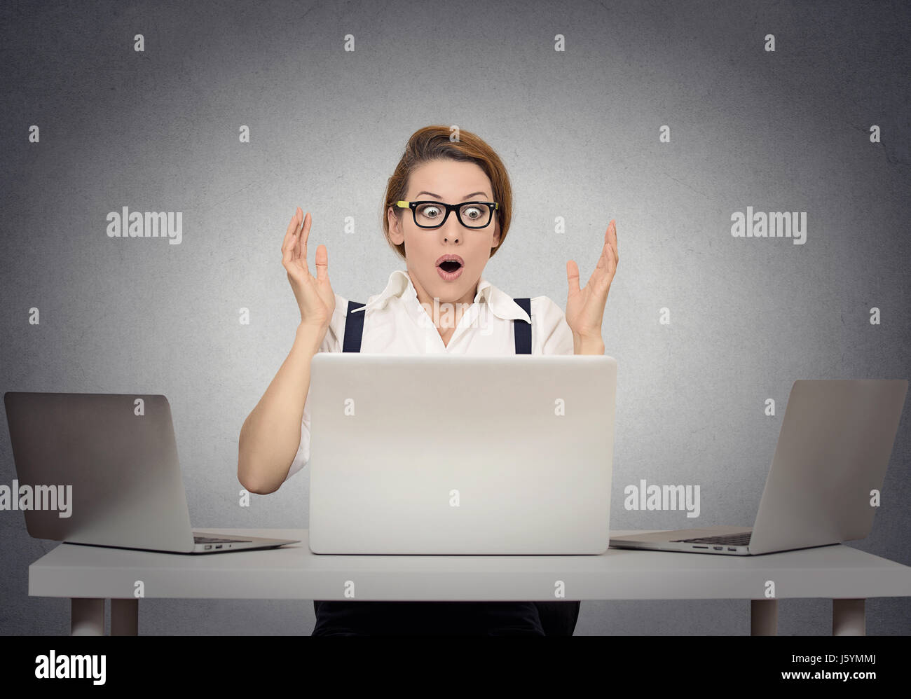 Shocked surprise businesswoman laptop hi-res stock photography and ...