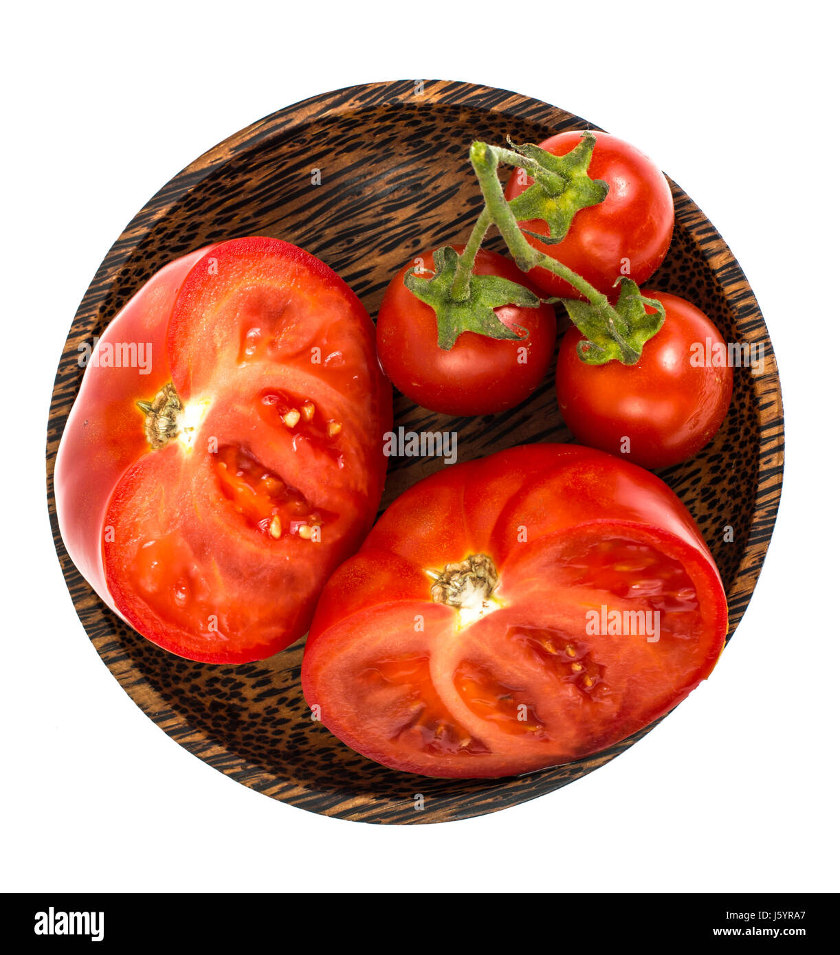 Red tomato, cut in half. Studio Photo Stock Photo - Alamy