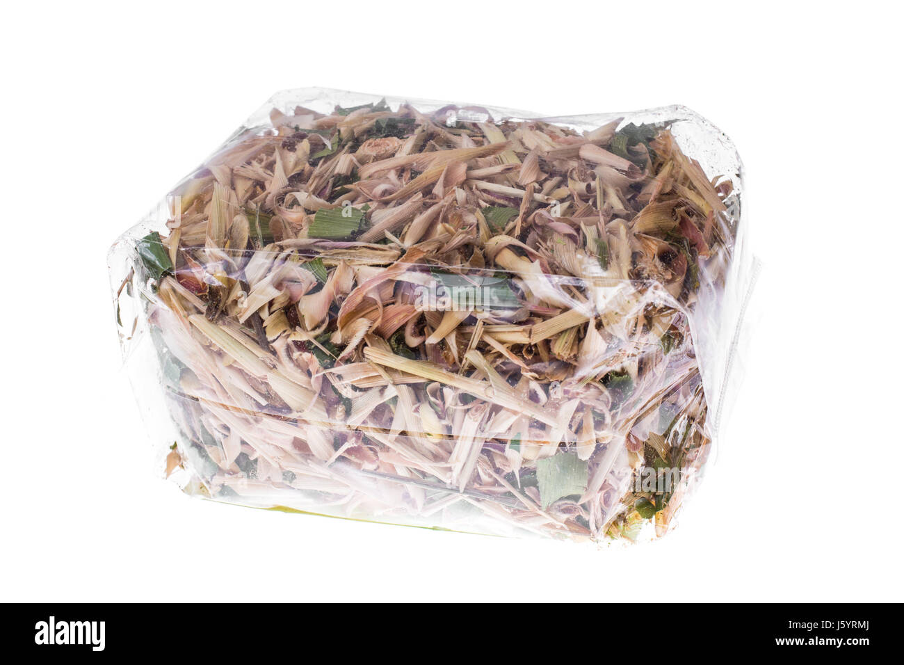 Dry leaves green grass in Cut Out Stock Images & Pictures - Alamy