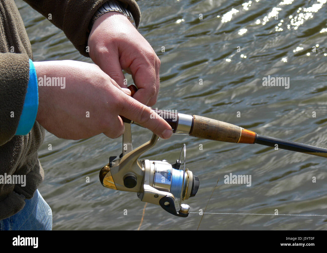 hand hands fishing rod angler water hand detail relaxation waters radio ...