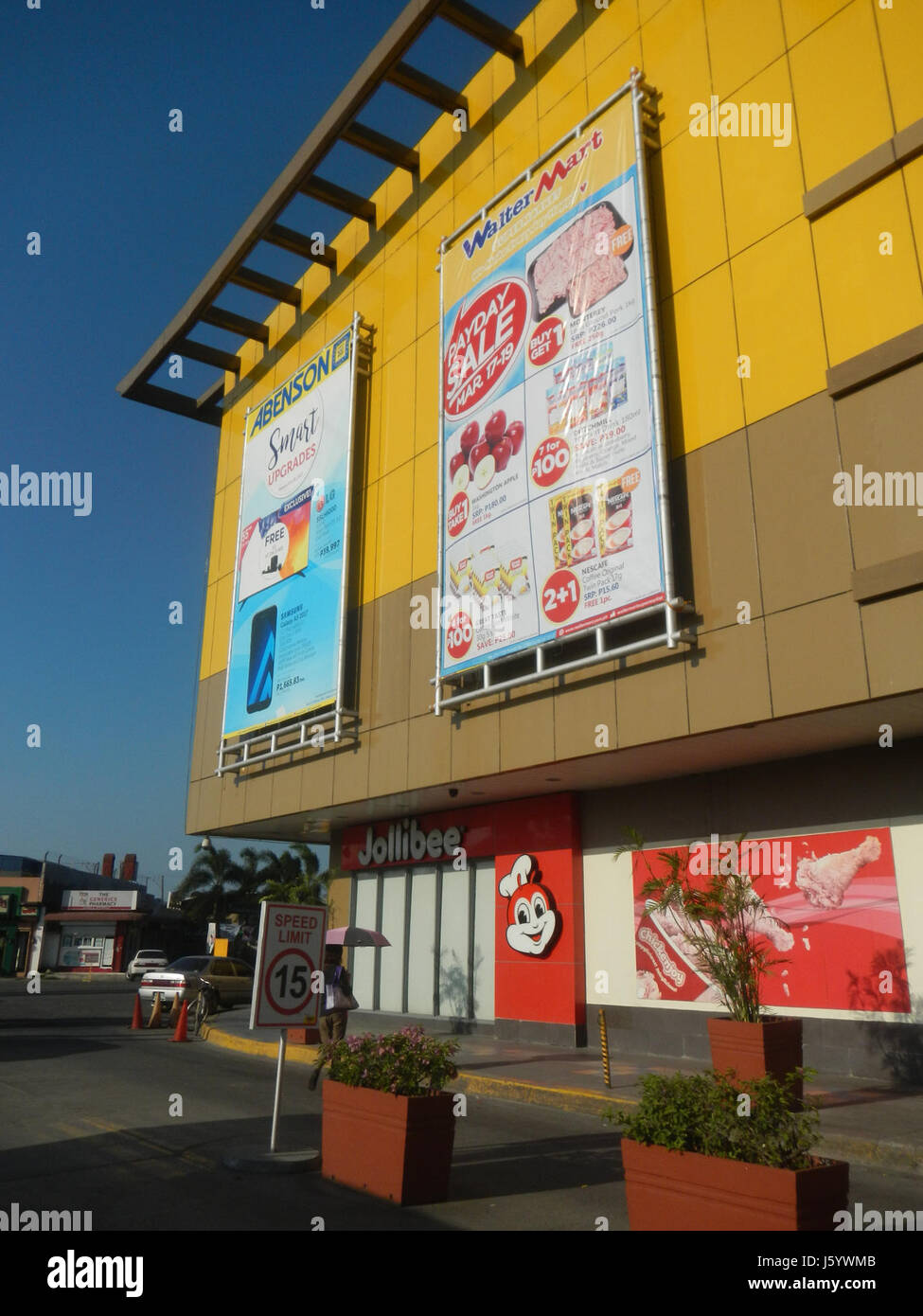 This image shows the exterior of Water Mart, a commercial establishment ...