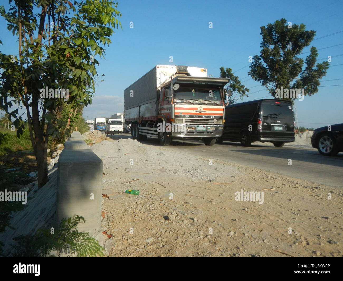 This road project involves the construction of an access service ...