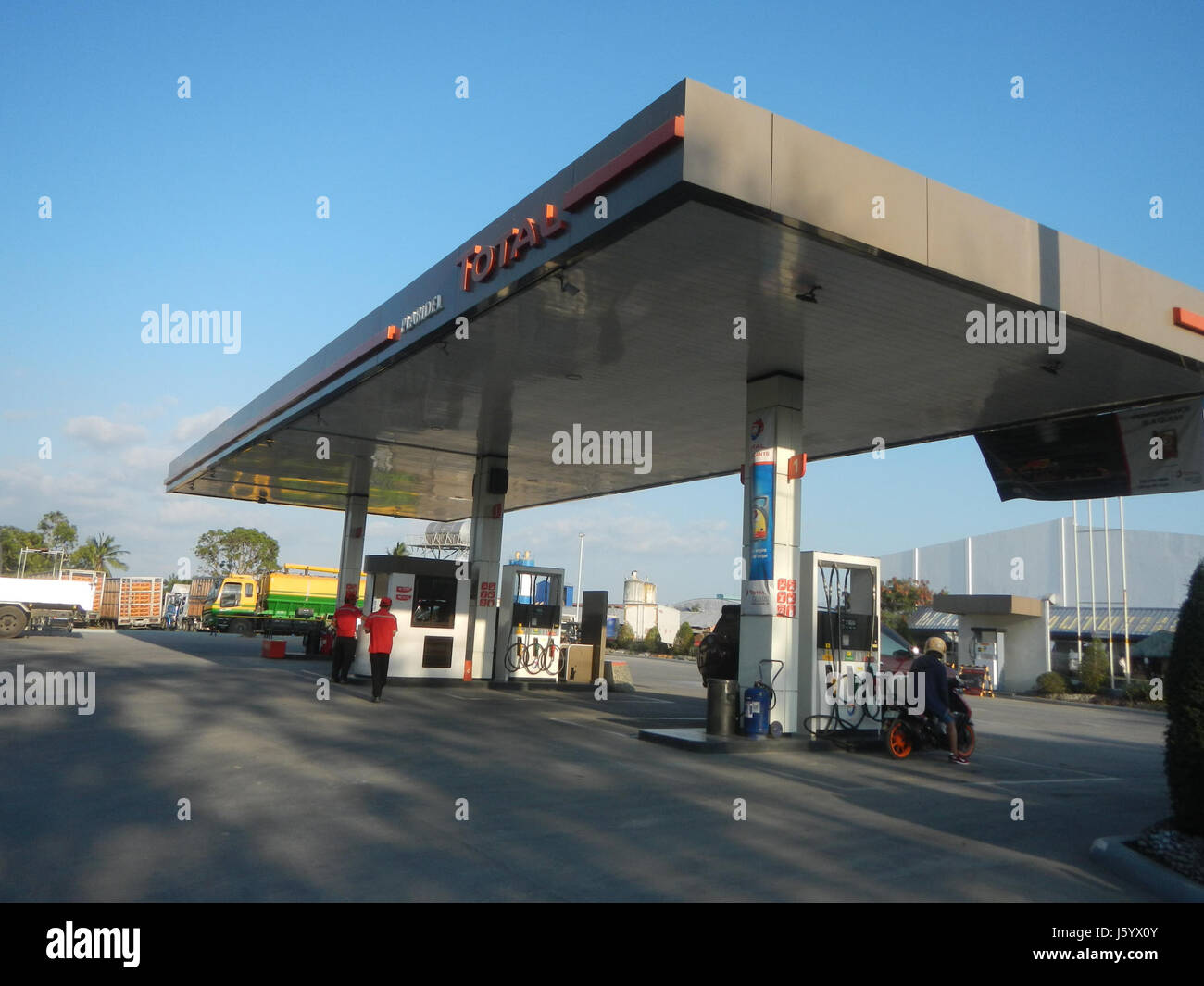 The image depicts a street view from Parulan, Plaridel, Bulacan ...