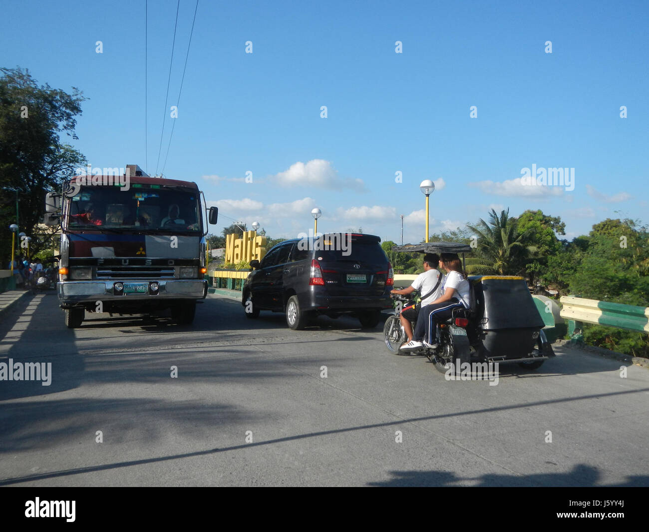 This image depicts the fields and infrastructure along *Malis Creek ...