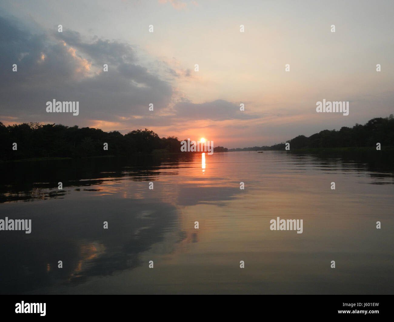 This image features a sunset view over the riverside districts in ...
