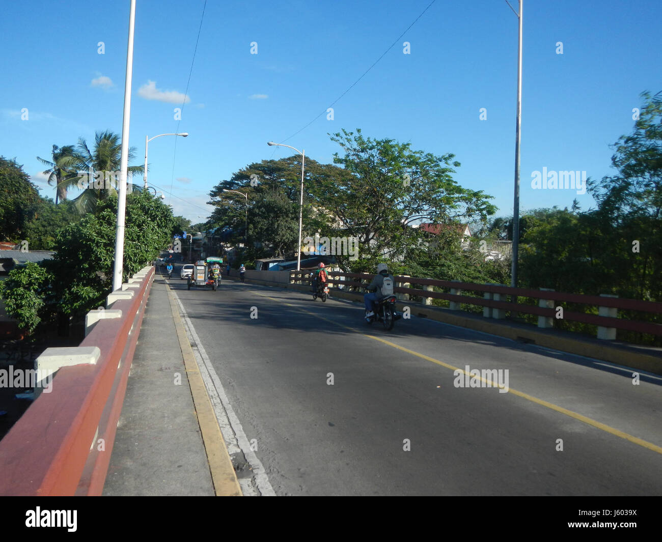 This image features the Santa Rosa Bridge in Pasig City, crossing the ...