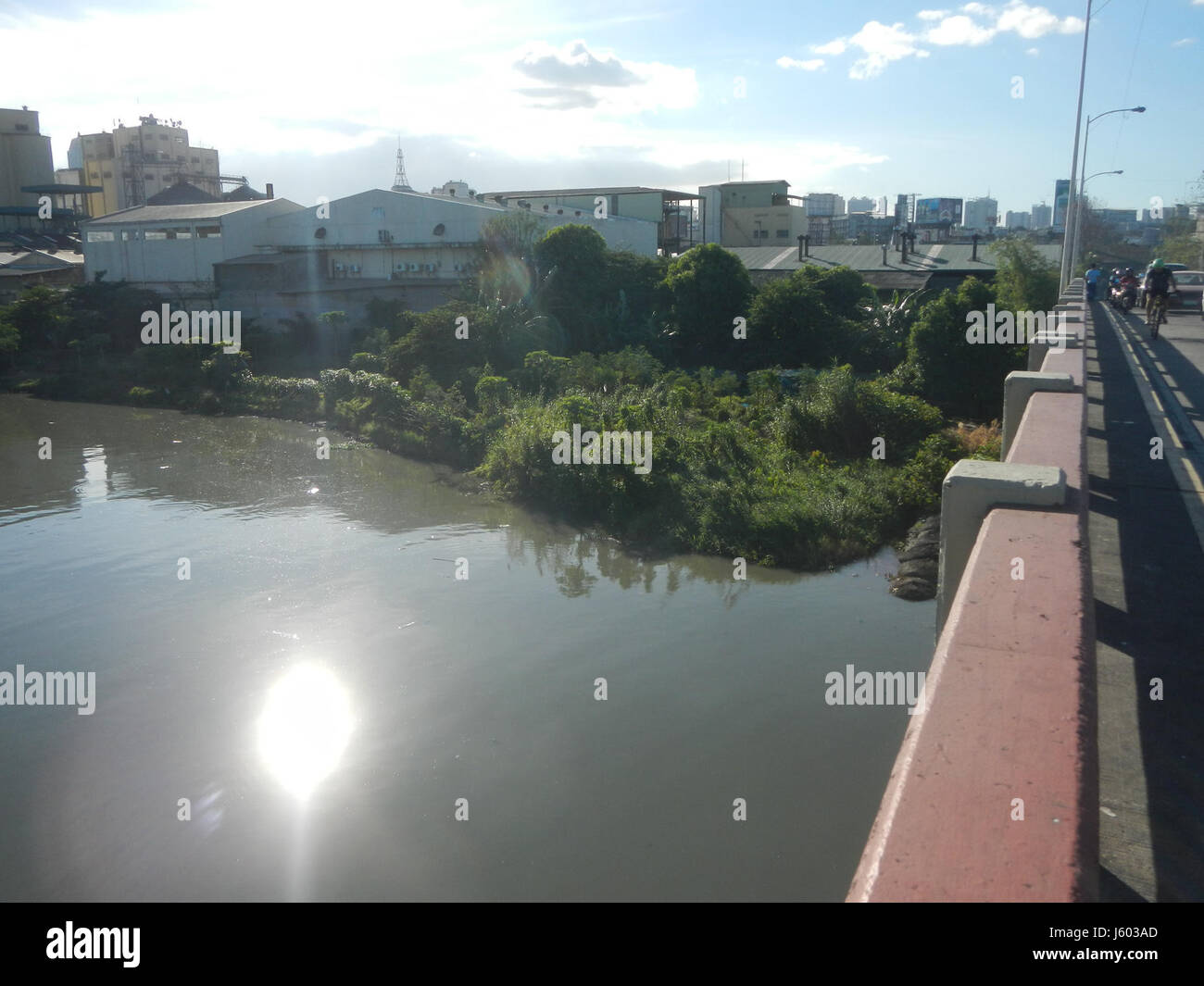 This image shows the Santa Rosa Bridge, located over the Bagong Ilog ...