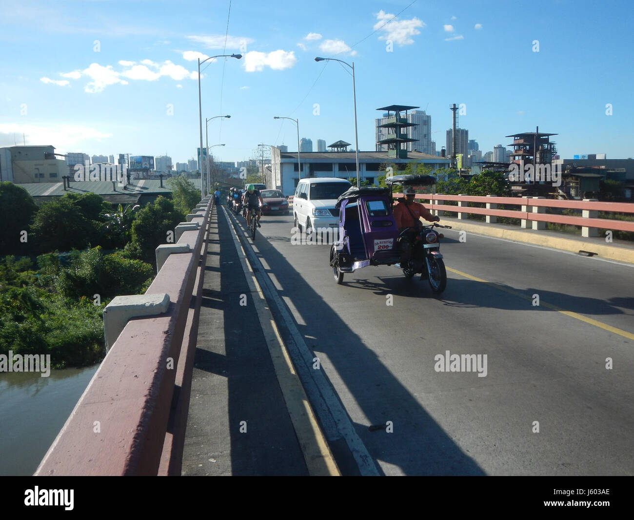 The Santa Rosa Bridge crosses the Bagong Ilog River in Pasig City ...