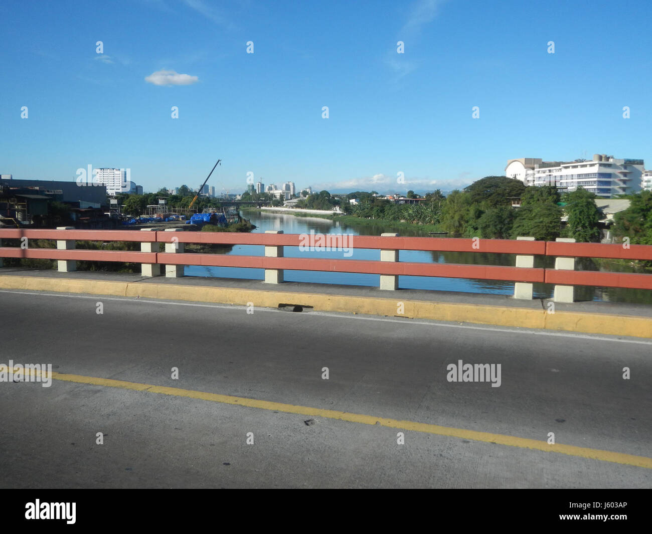 The Santa Rosa Bridge, located over the Bagong Ilog River in Pasig City ...