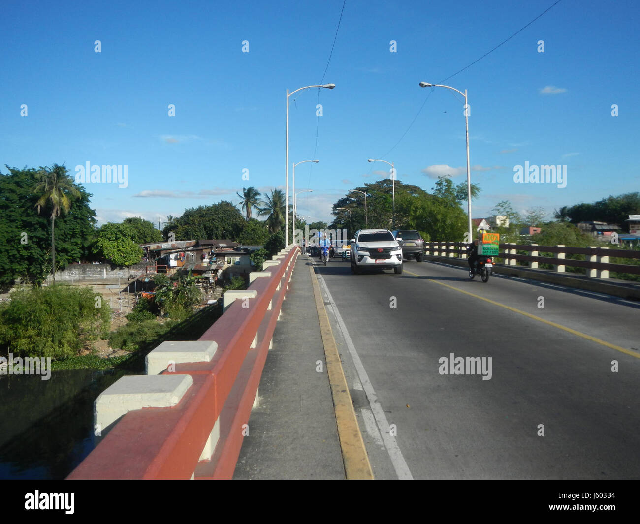 A significant bridge crossing the Bagong Ilog River in Pasig City ...