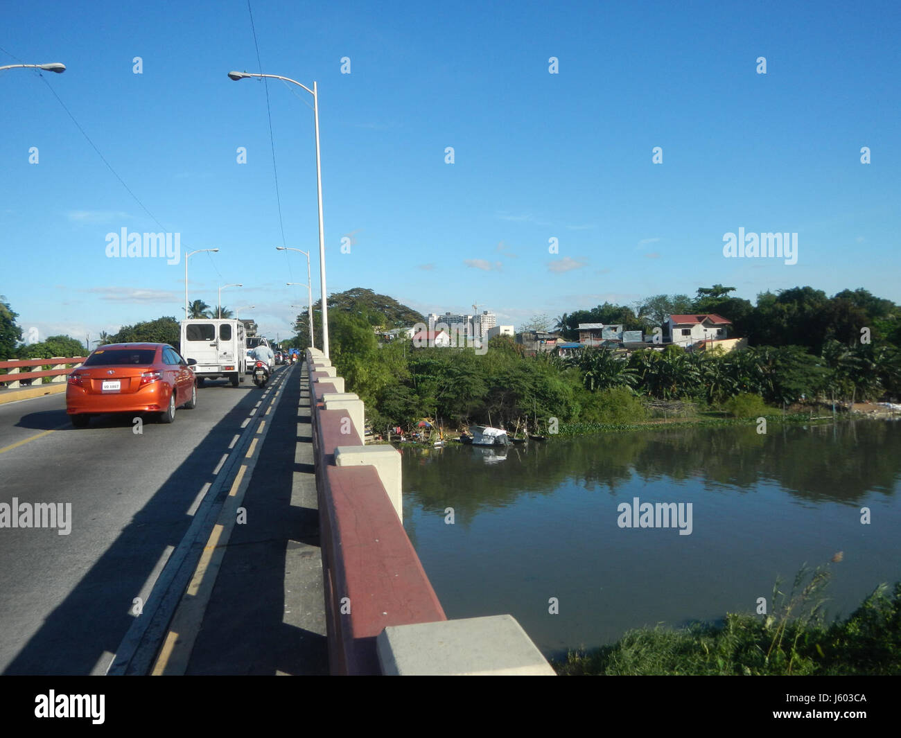 A photograph of Santa Rosa Bridge over the Bagong Ilog River in Pasig ...