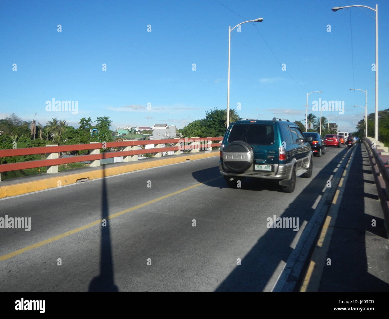 This image shows the Santa Rosa Bridge located across the Bagong Ilog ...