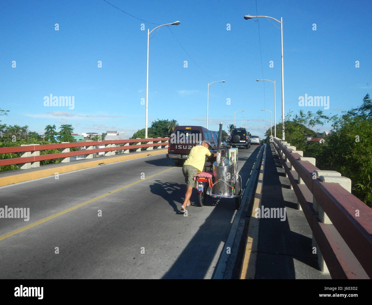 The Santa Rosa Bridge spans the Bagong Ilog River in Pasig City ...