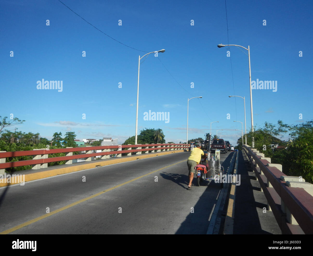 This image depicts the Santa Rosa Bridge over the Bagong Ilog River in ...