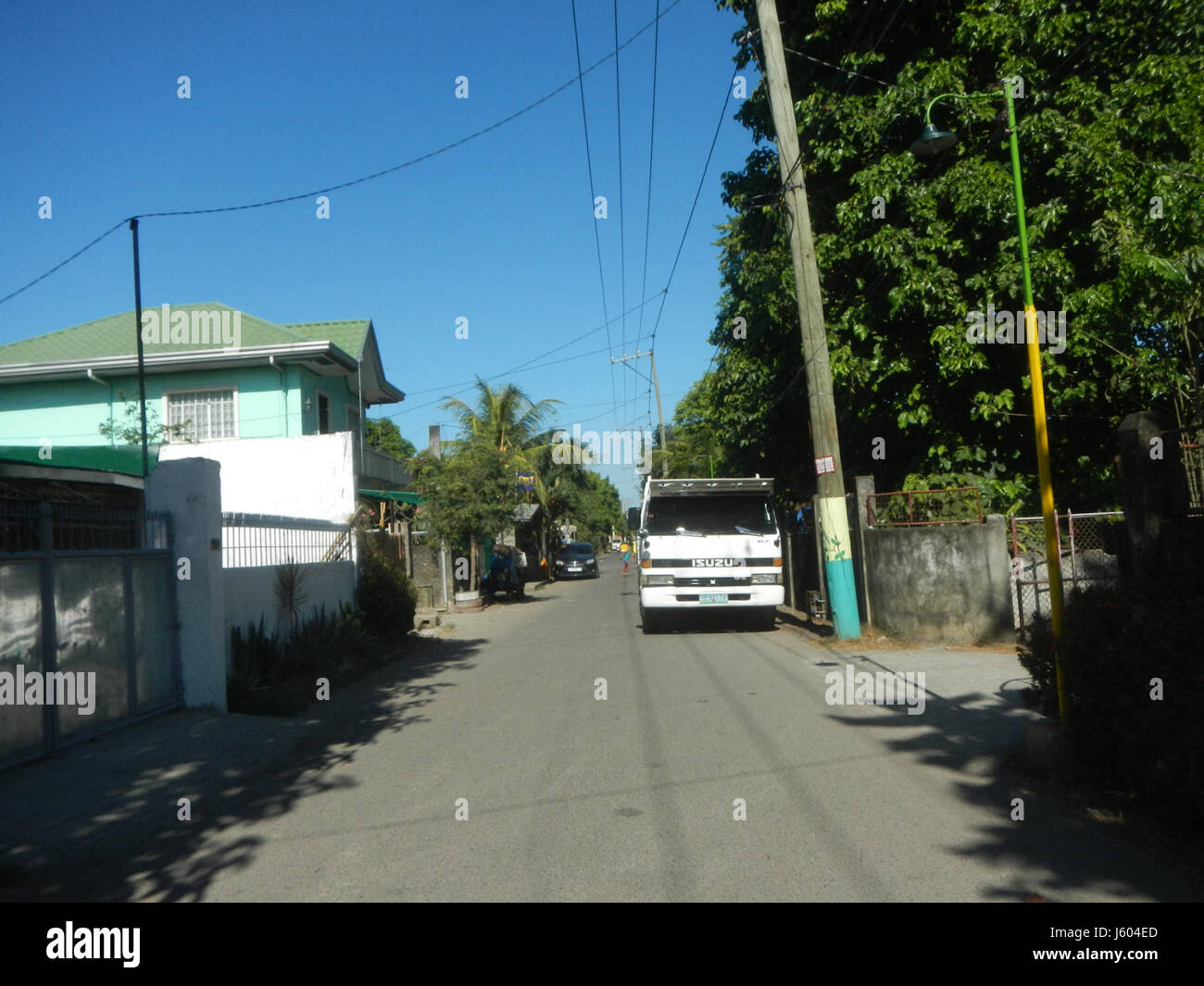 This image shows the construction of a road in Plaridel, Bulacan ...